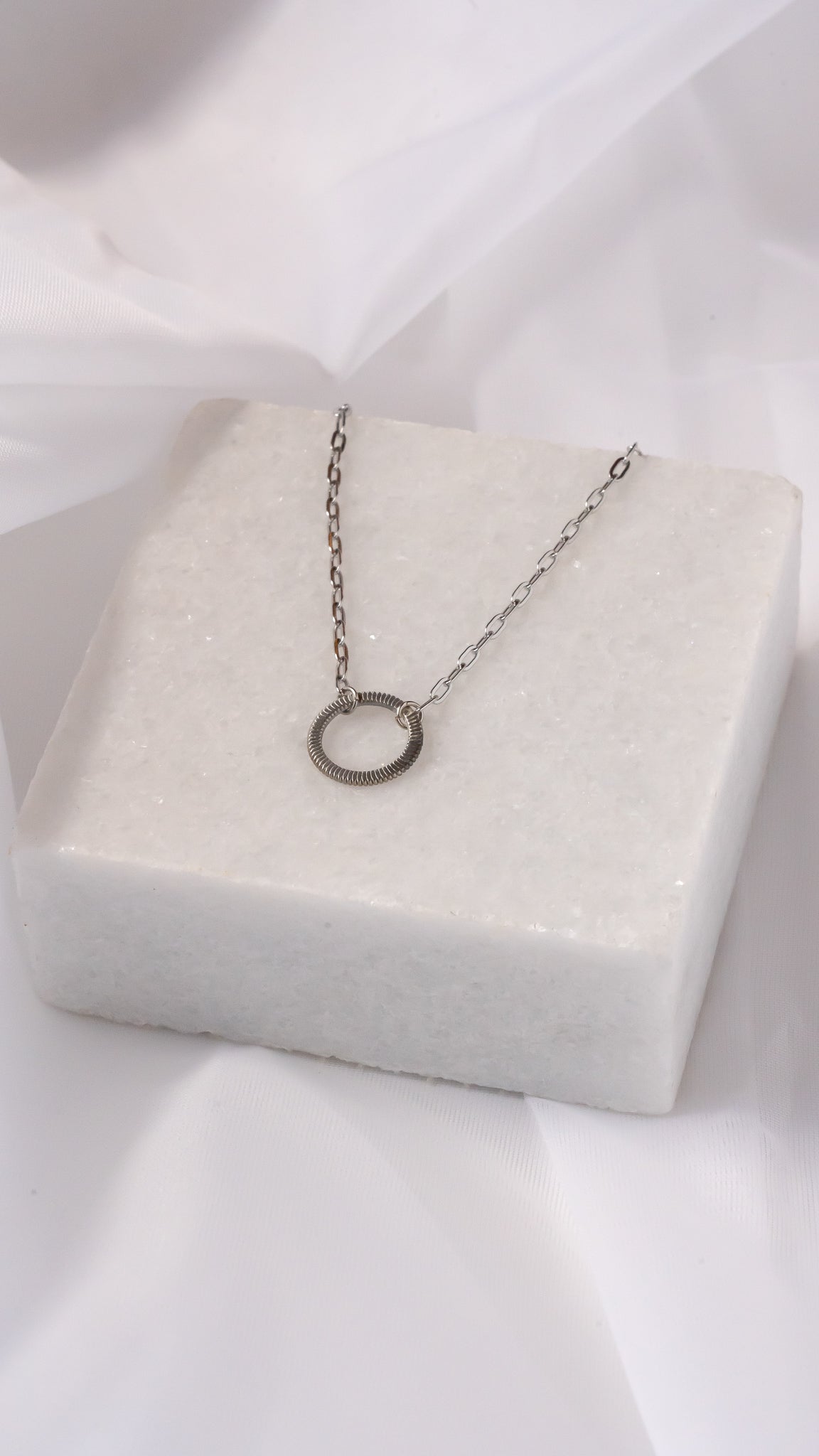 Guitar string jewelry made by women in recovery – Strings for Hope